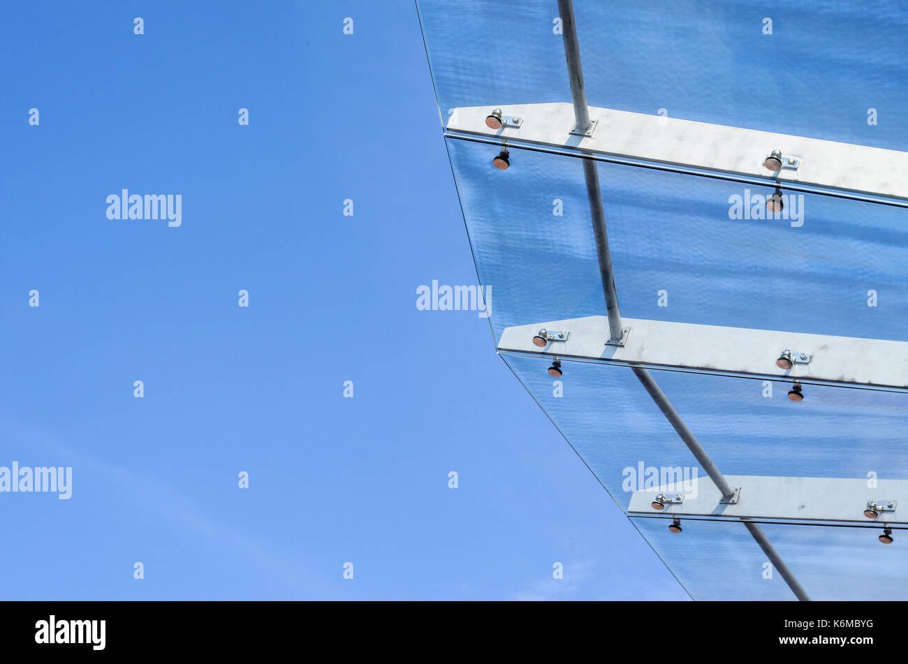 Glass Canopy Against Blue Sky Background. Fastening Elements of Glass ...