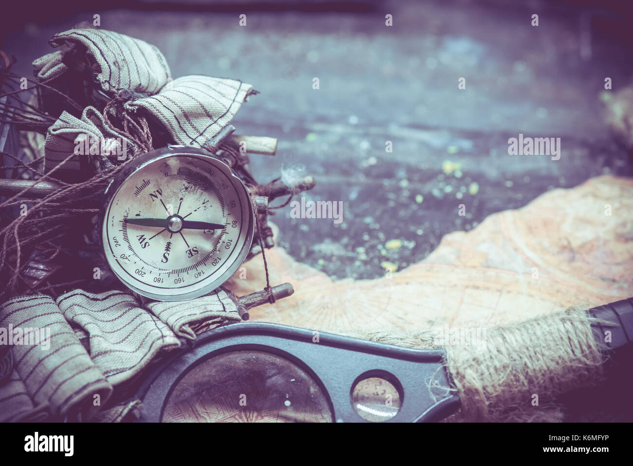 Columbus day and world map with compass Stock Photo - Alamy