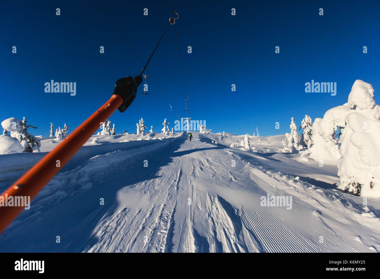 Beautiful cold mountain view of ski resort, sunny winter day with slope ...