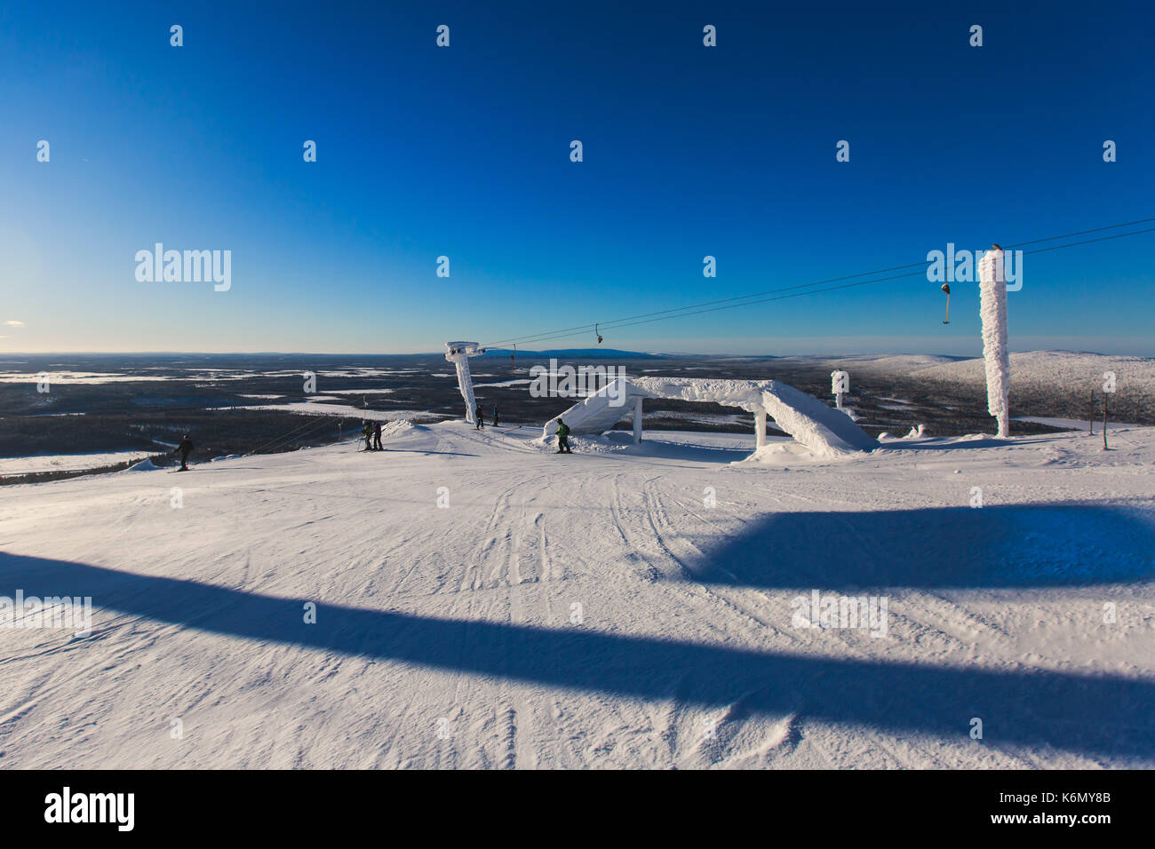 Beautiful cold mountain view of ski resort, sunny winter day with slope ...