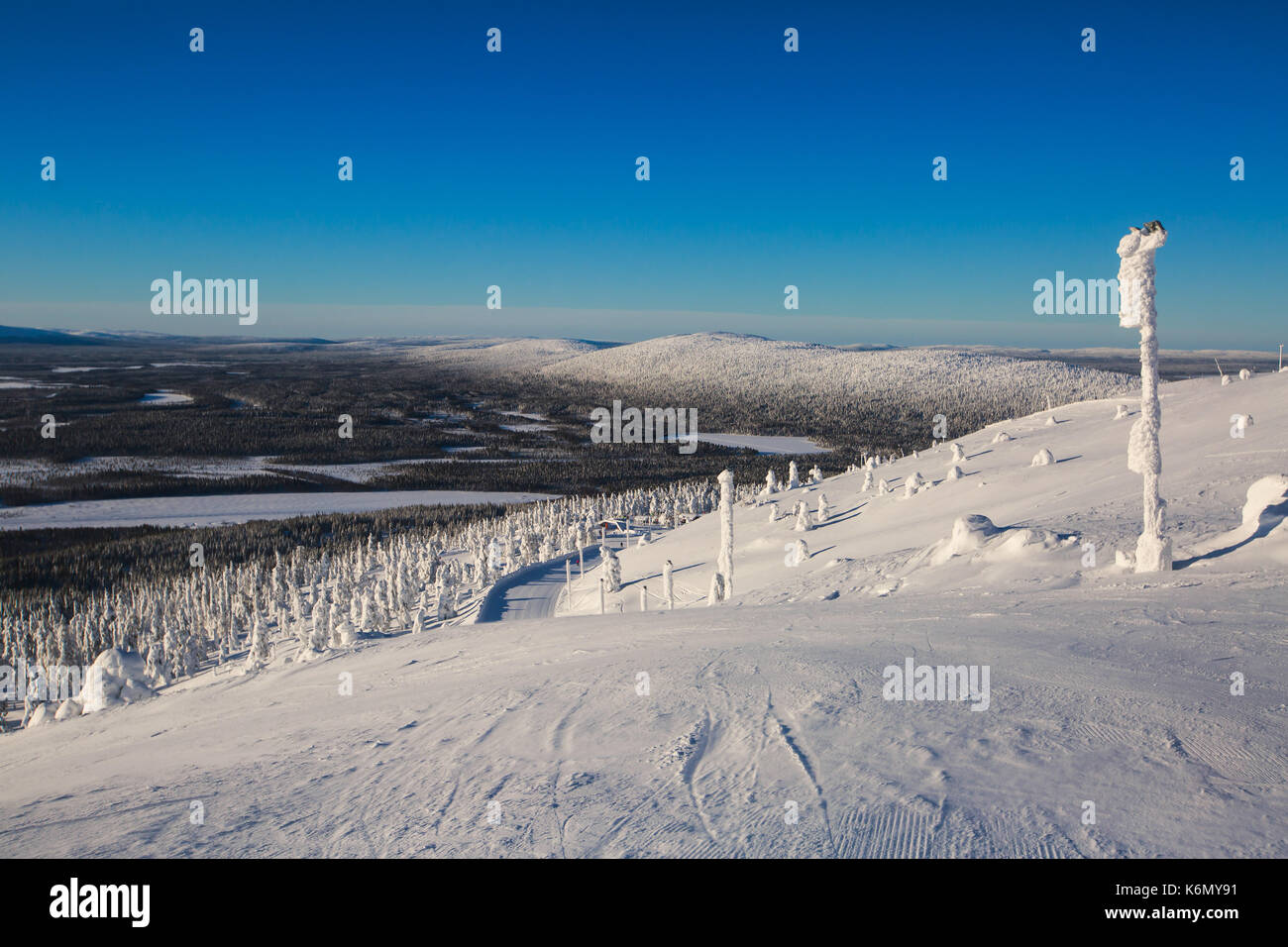 Beautiful cold mountain view of ski resort, sunny winter day with slope ...