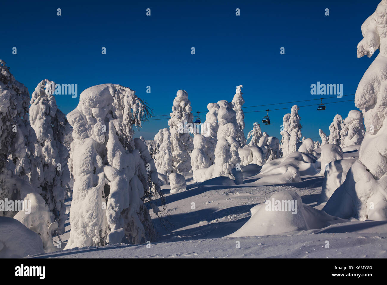 Beautiful cold mountain view of ski resort, sunny winter day with slope ...