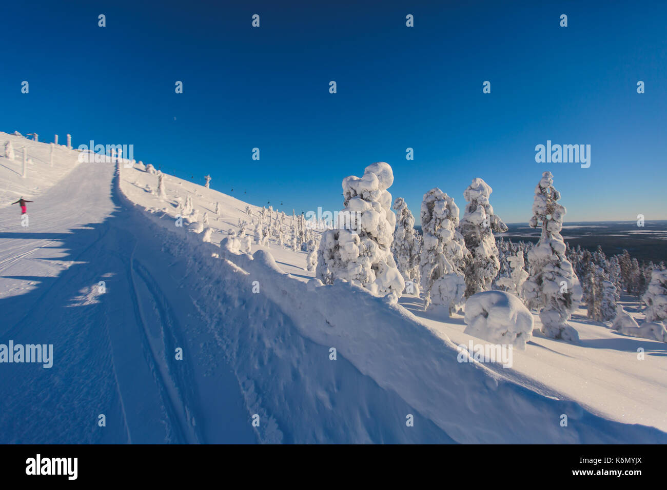 Beautiful cold mountain view of ski resort, sunny winter day with slope ...