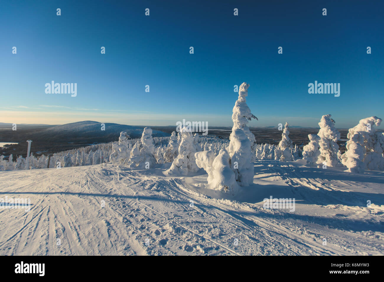 Beautiful cold mountain view of ski resort, sunny winter day with slope ...