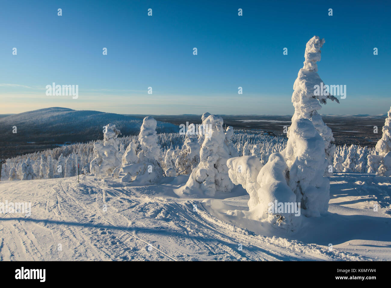 Beautiful cold mountain view of ski resort, sunny winter day with slope ...