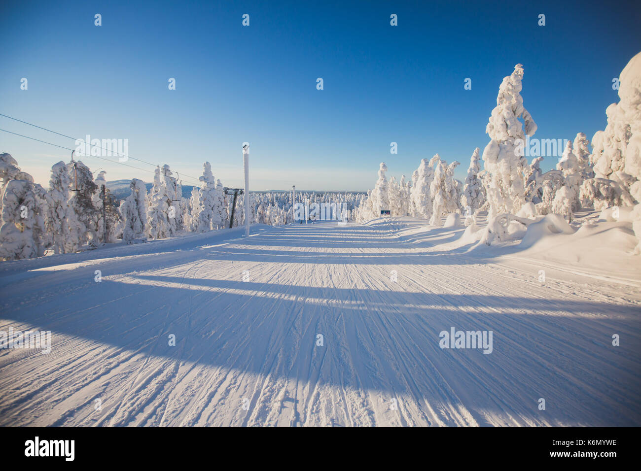 Beautiful cold mountain view of ski resort, sunny winter day with slope ...