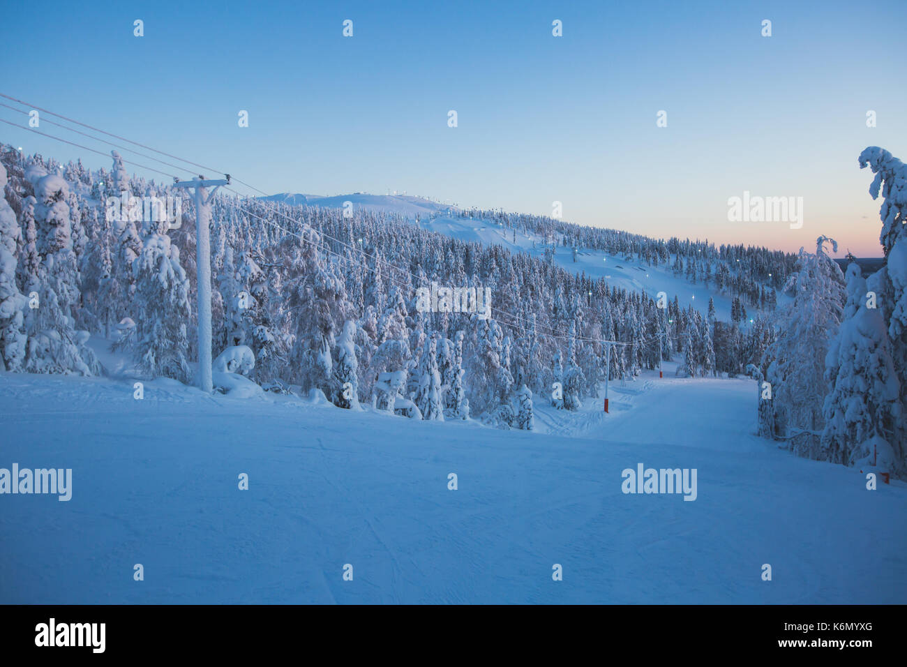 Beautiful cold mountain view of ski resort, sunny winter day with slope ...