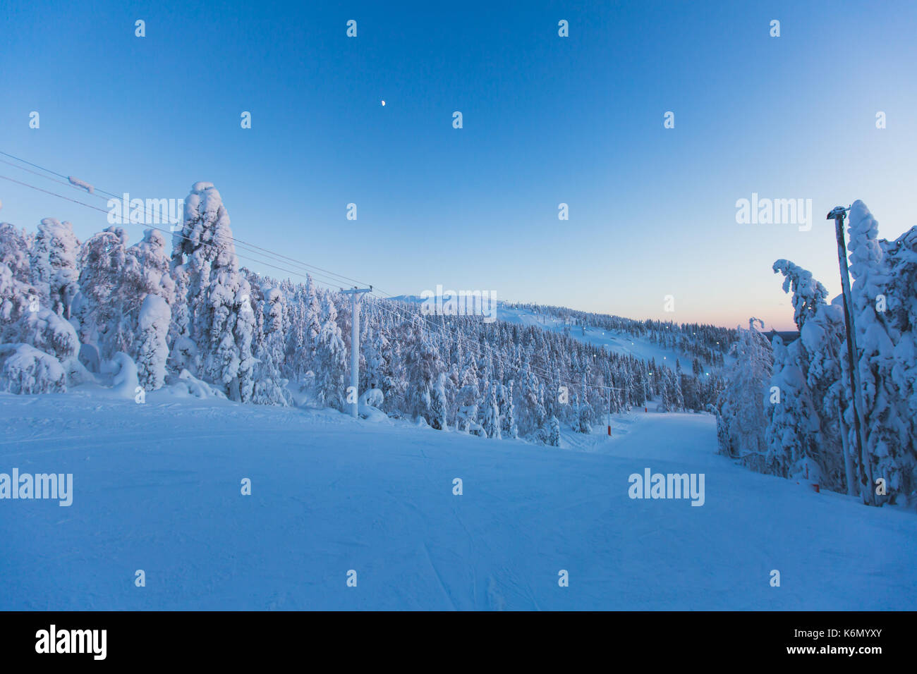 Beautiful cold mountain view of ski resort, sunny winter day with slope ...