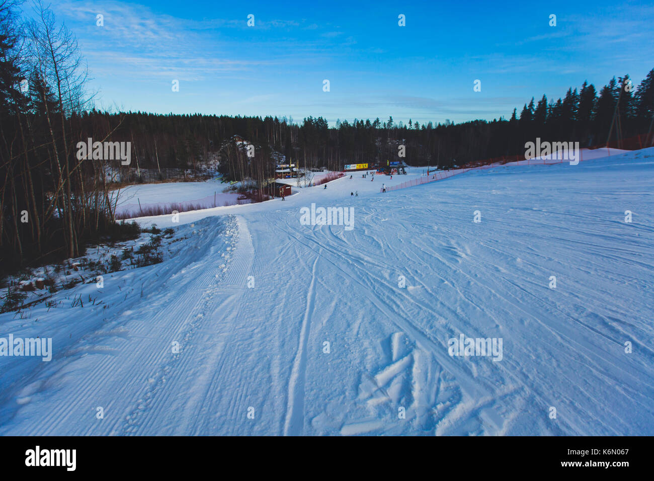 Beautiful cold mountain view of ski resort, sunny winter day with slope ...