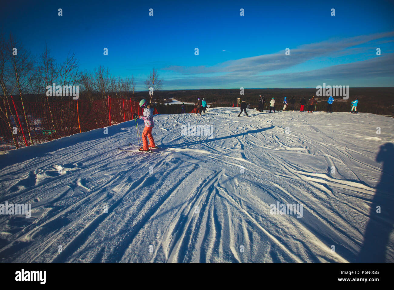 Beautiful cold mountain view of ski resort, sunny winter day with slope ...