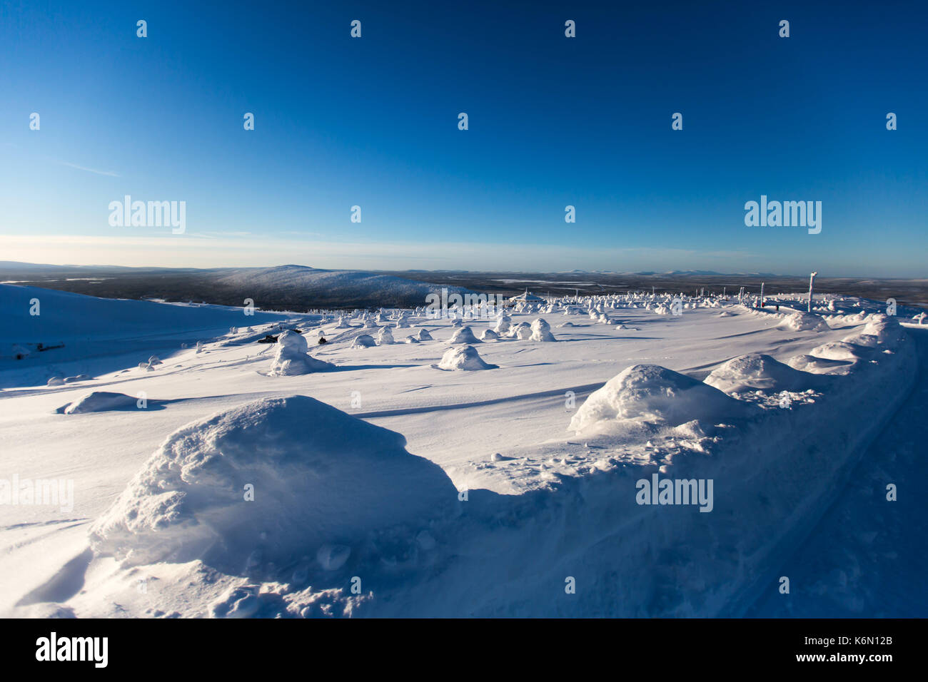 Beautiful cold mountain view of ski resort, sunny winter day with slope ...