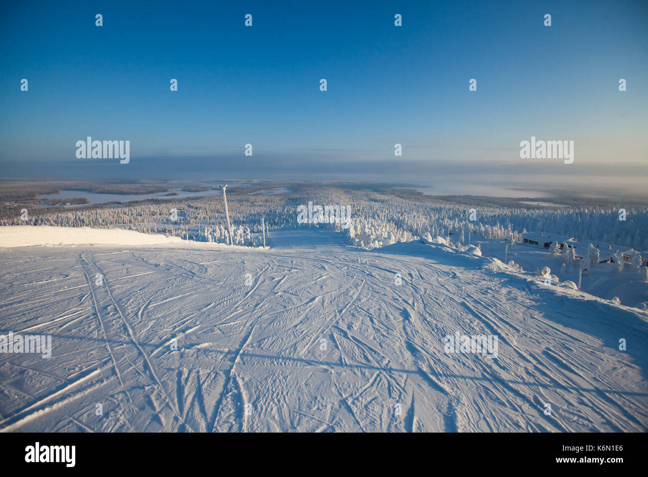 Beautiful cold mountain view of ski resort, sunny winter day with slope ...