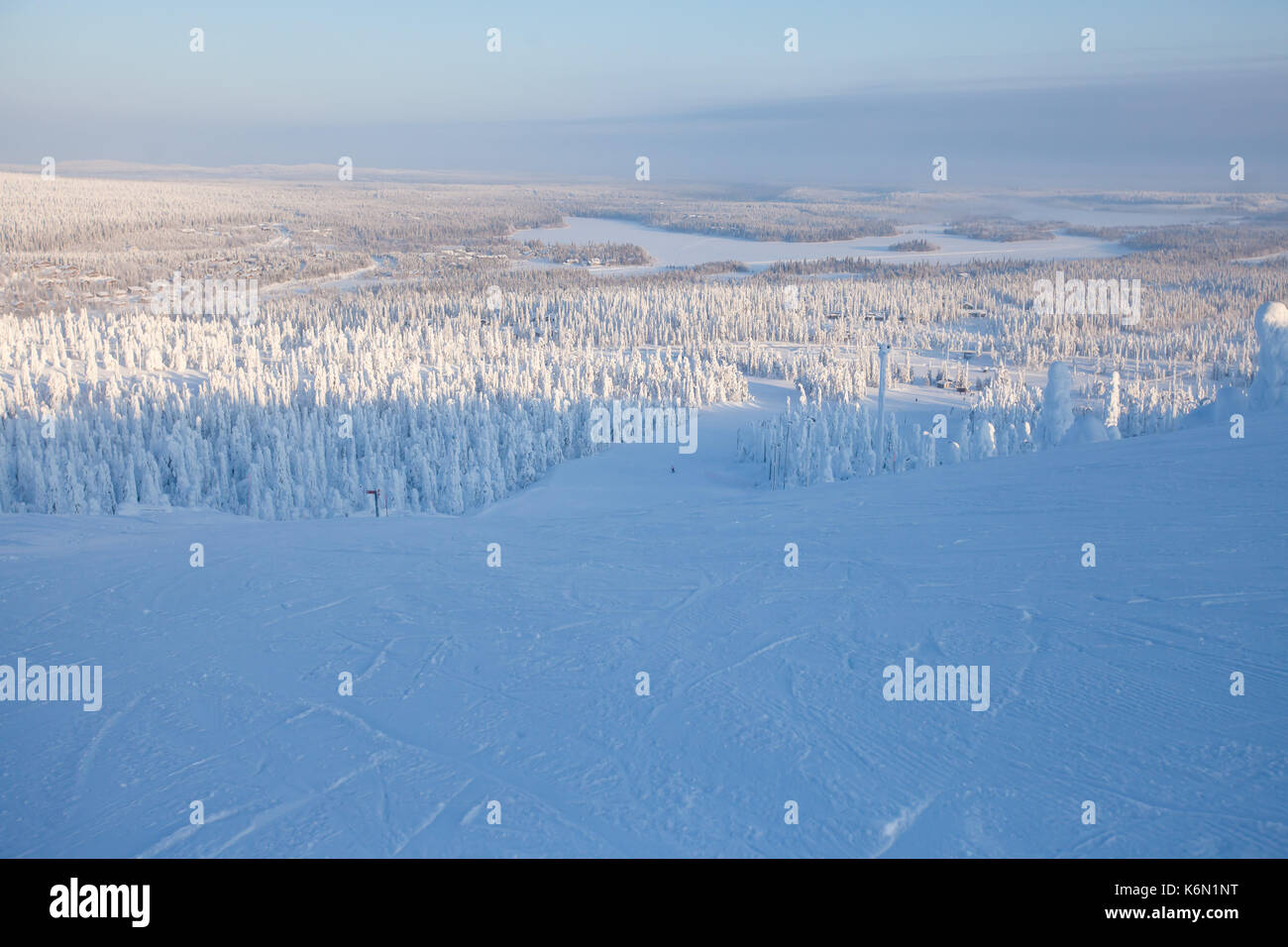 Beautiful cold mountain view of ski resort, sunny winter day with slope ...