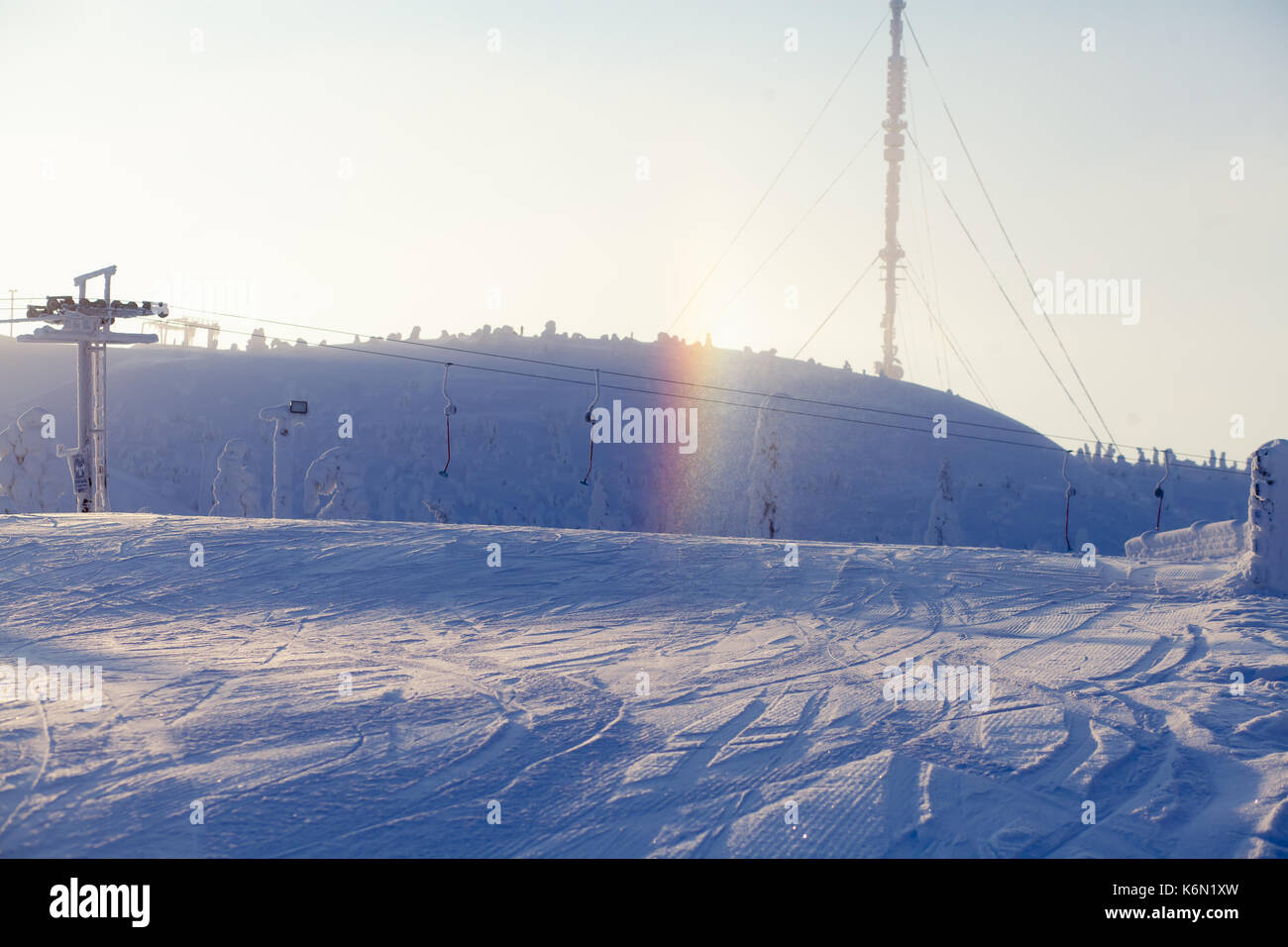 Beautiful cold mountain view of ski resort, sunny winter day with slope ...