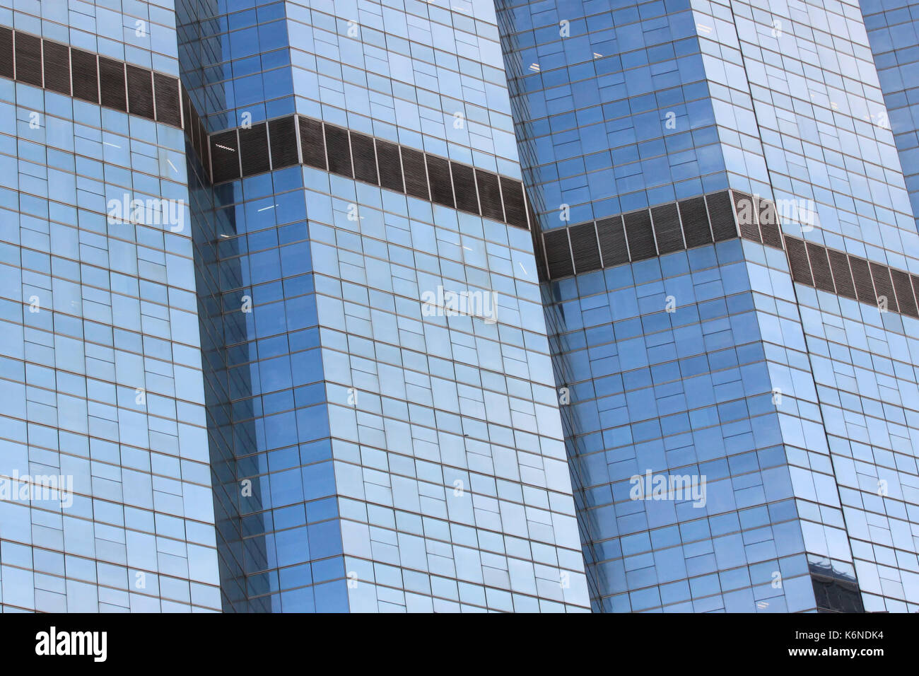 glass wall of a skyscraper for design business background in your work ...