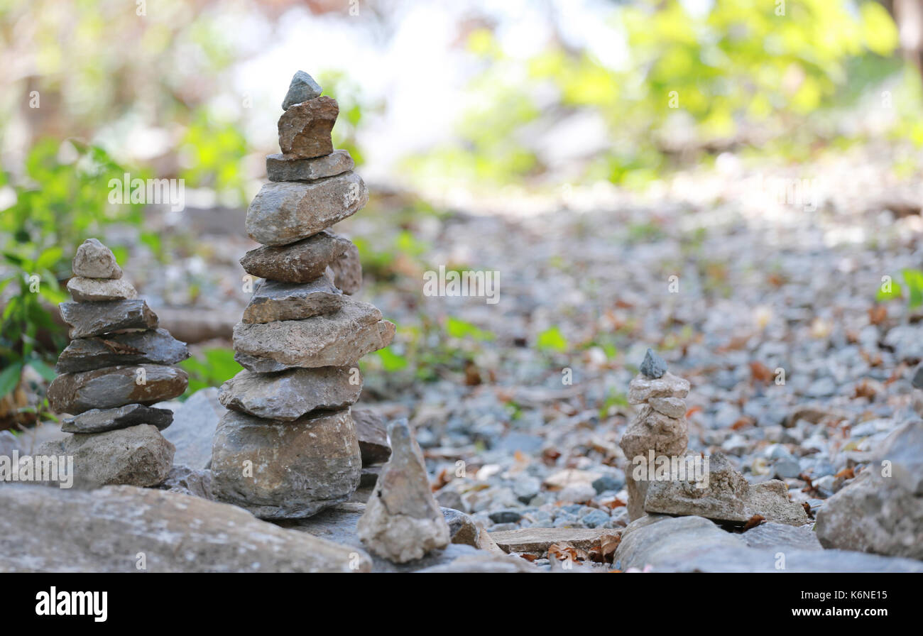stones stacked of pyramid shaped in concept of calm and meditation ...