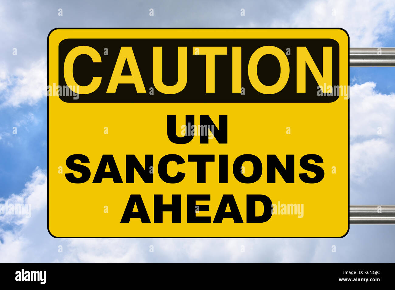 UN sanctions ahead, yellow warning road sign Stock Photo - Alamy