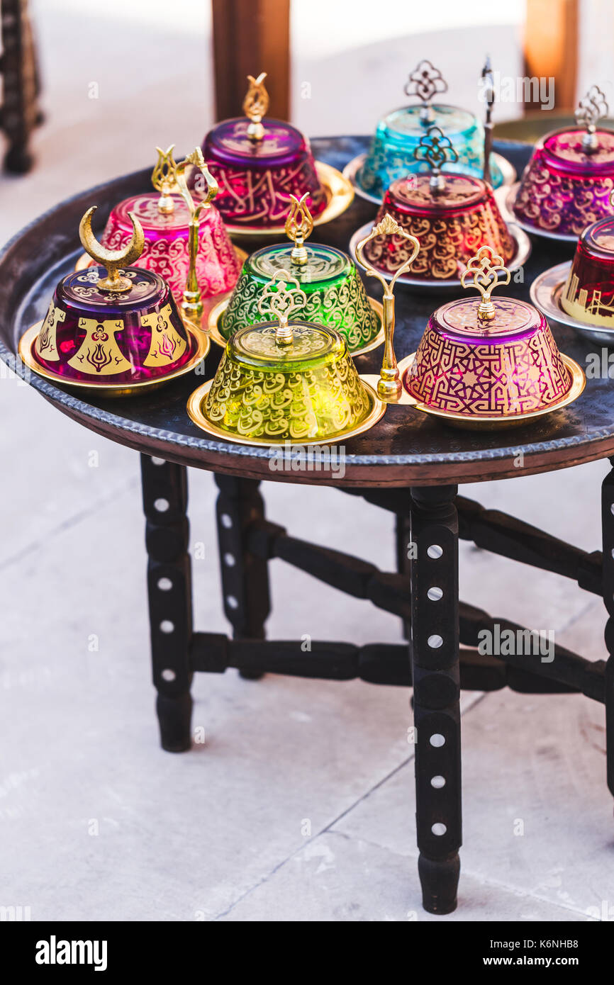 Stack of handmade multicolor Turkish dishes on the market. Vintage ...