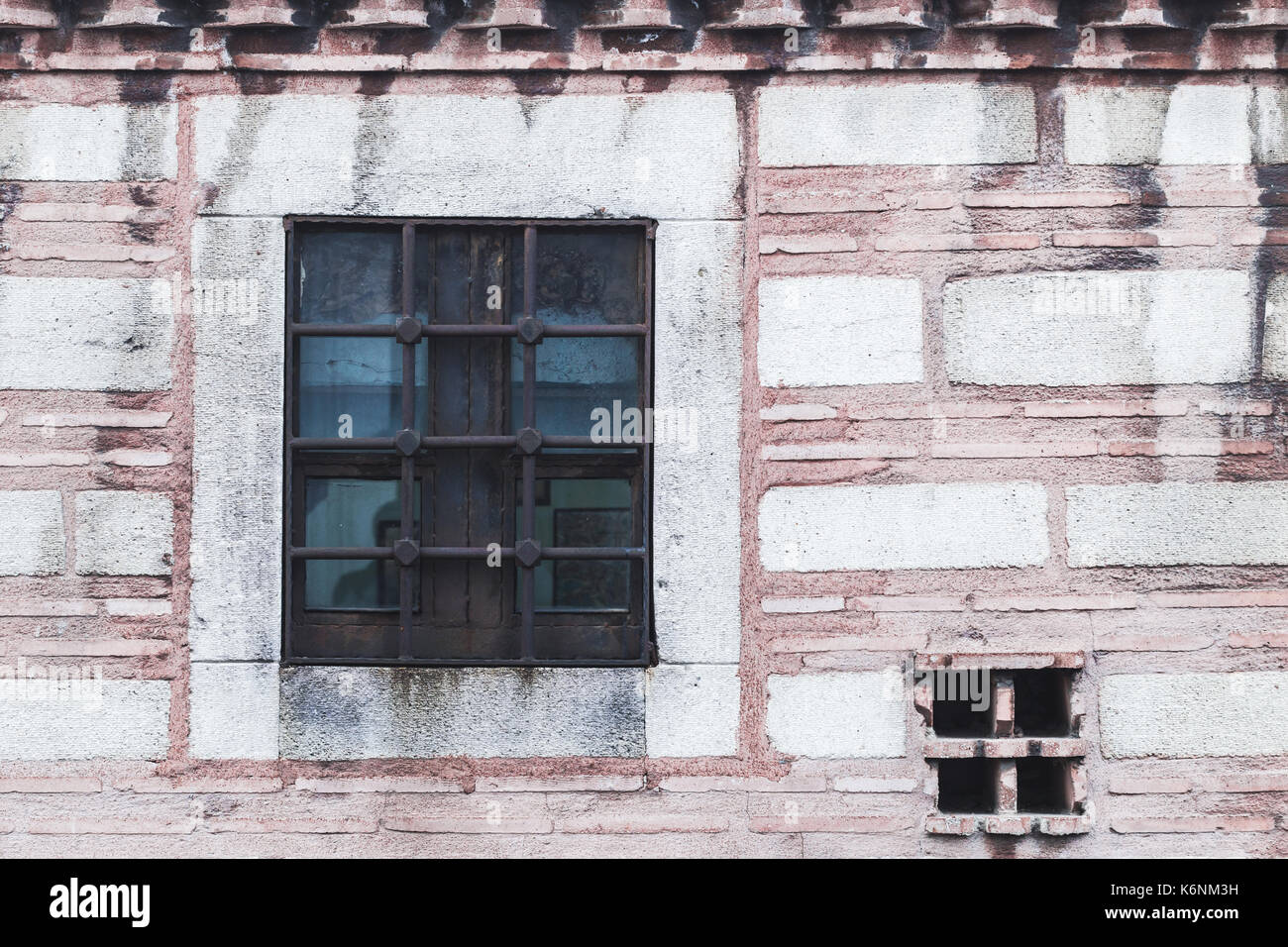 Beautiful stone and bricks facades with different sizes windows in ...