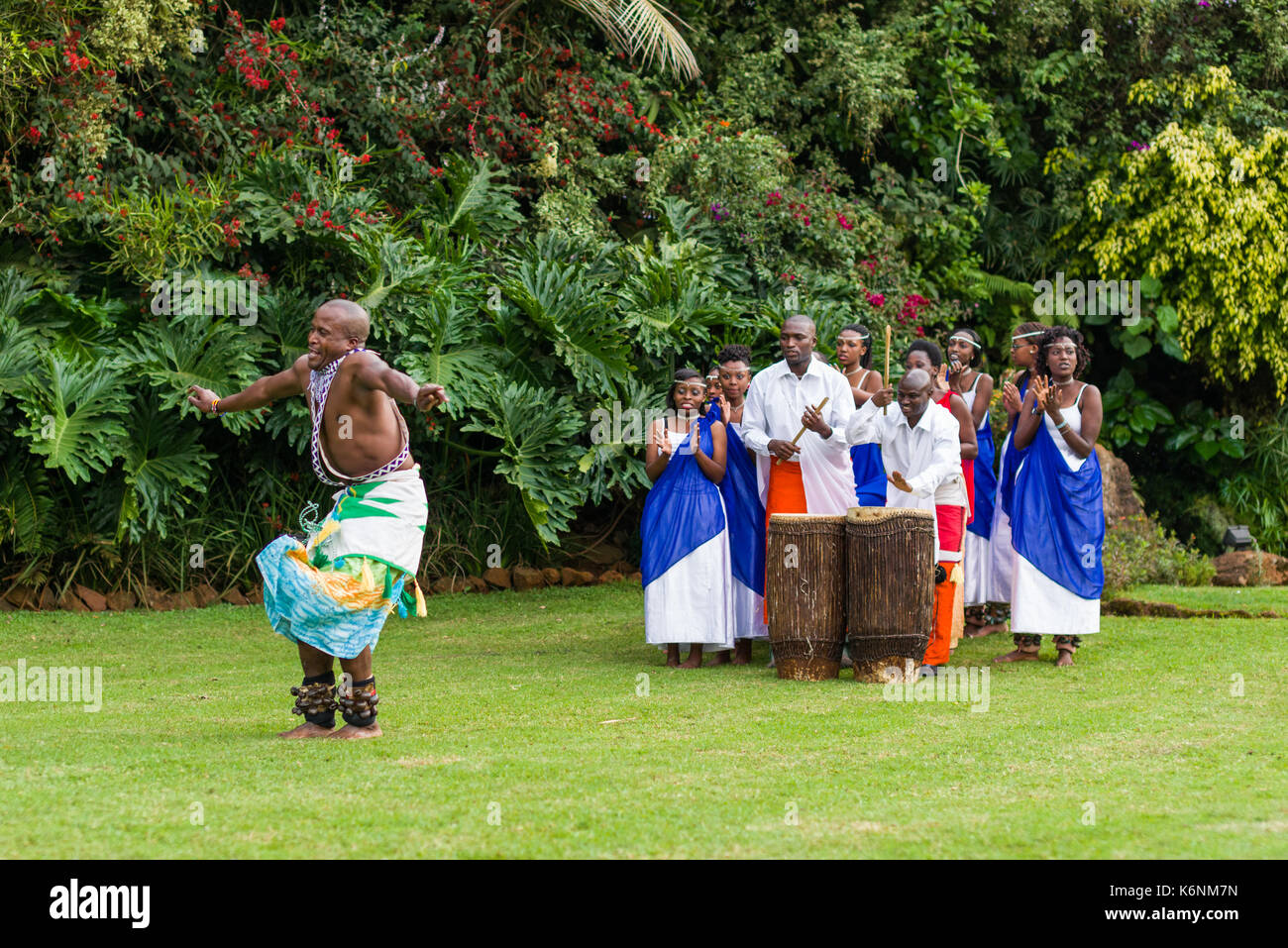 Rwandan male dancer performing traditional Rwandan Intore dance with ...