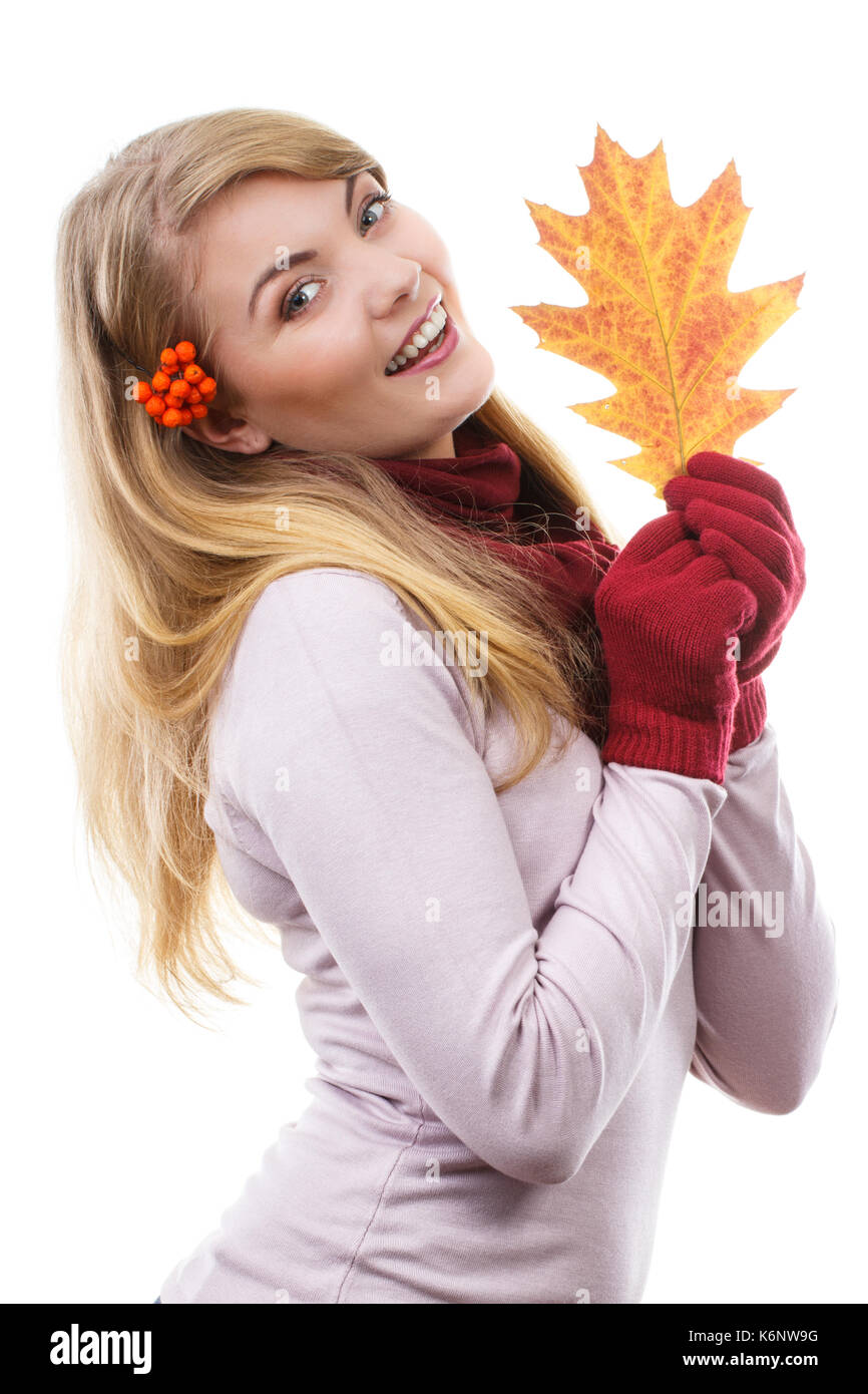 Happy smiling girl with rowan in hair wearing woolen shawl, gloves and ...