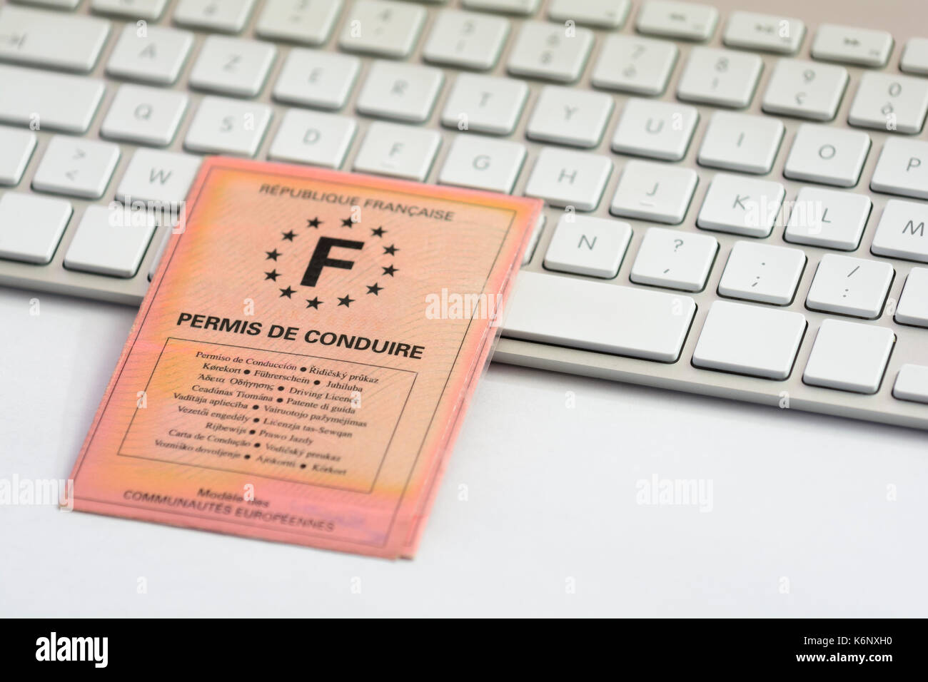 French driver licence and white keyboard Stock Photo - Alamy