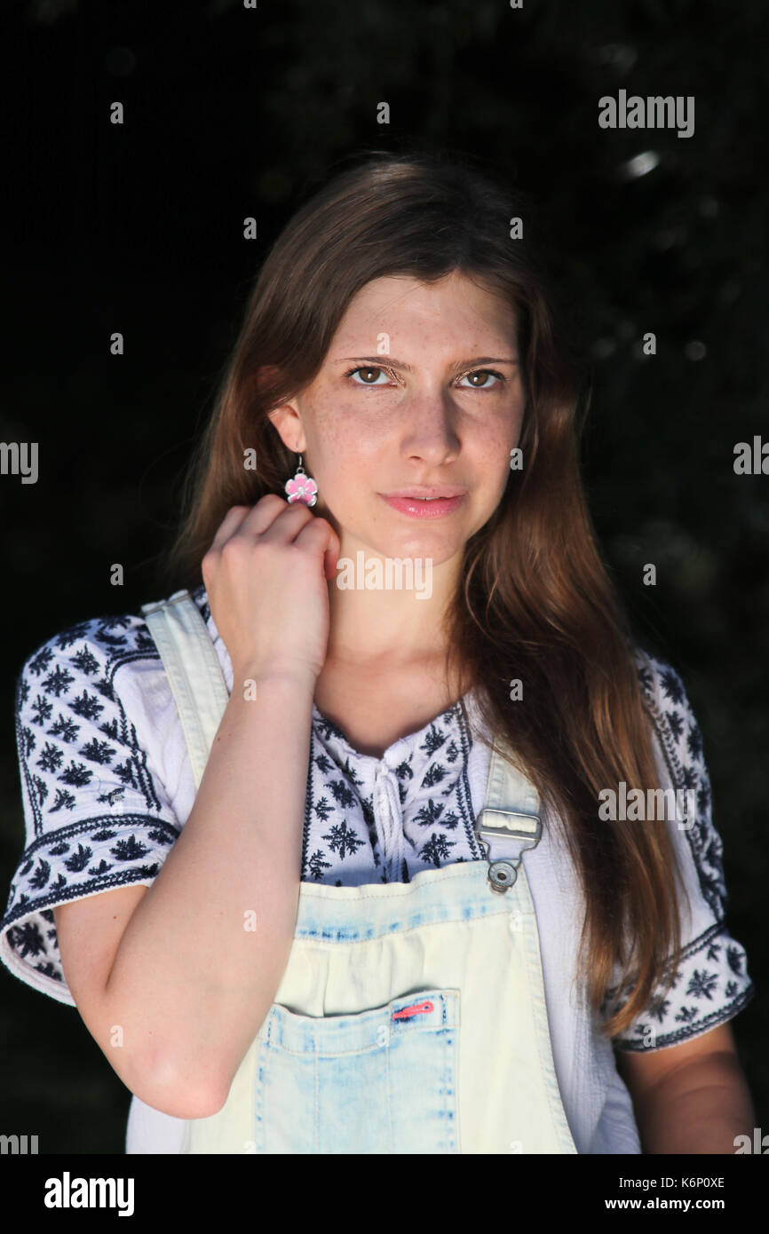 Woman with freckles and hot pants while fishing Stock Photo - Alamy