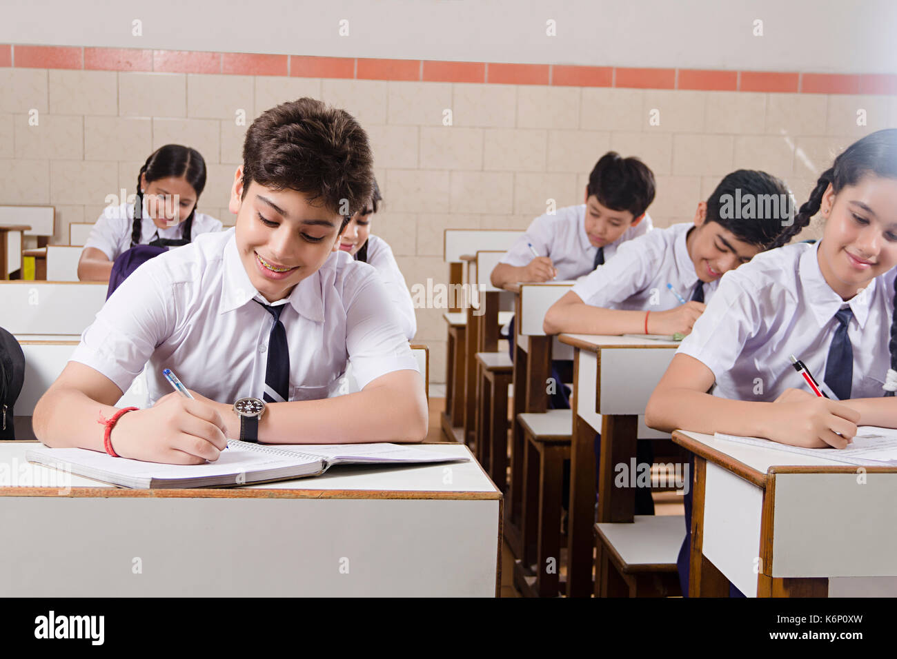 Indian Group School Boys And Girls Students Book Writing Education In ...