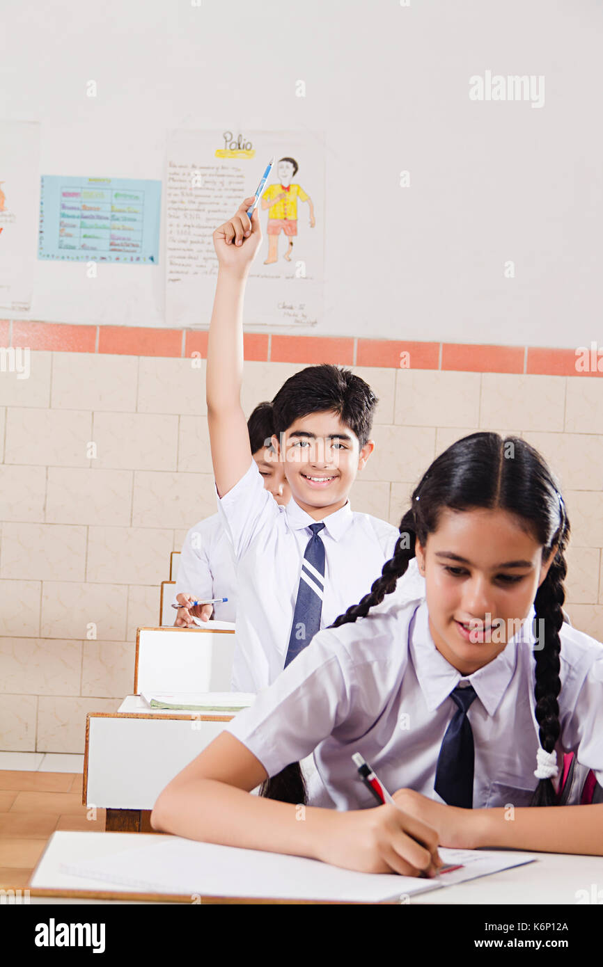 Happy Indian School Kids Students Studying Hand Raised In Classroom ...