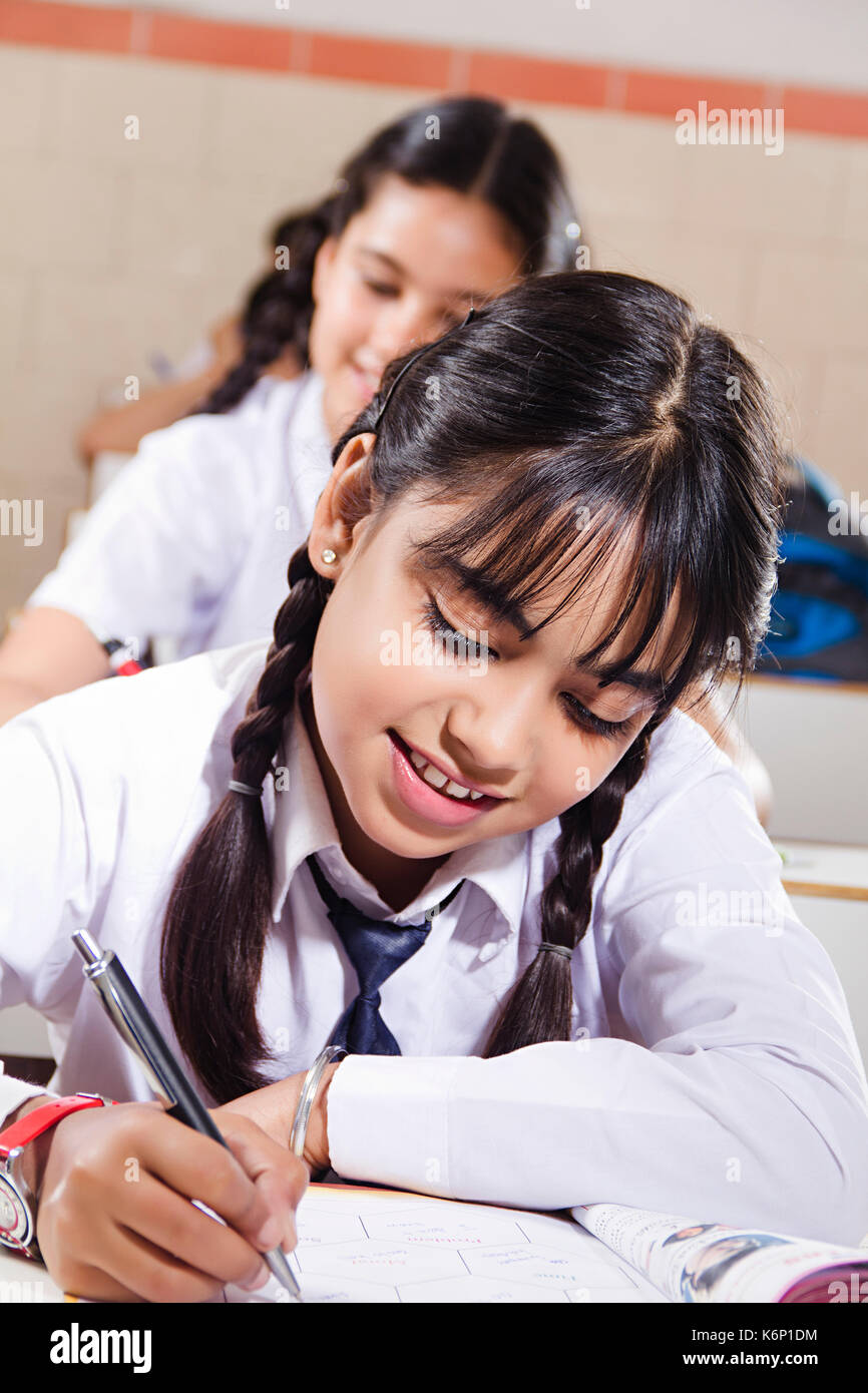 Smiling Indian School Kid Girl Student Note Book Writing Studying ...