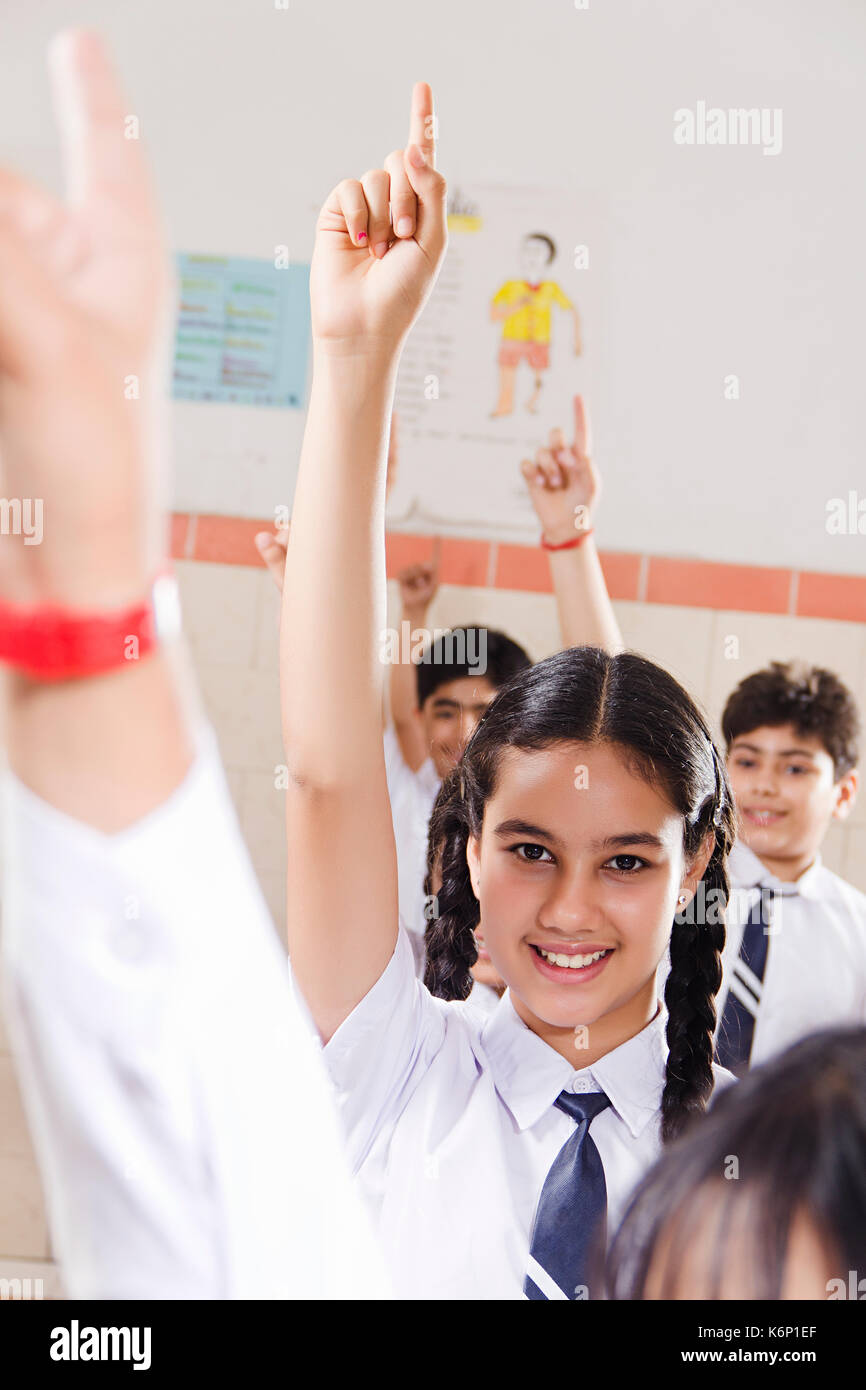 Indian Group School Kids Students Studying Hand Raised In Classroom ...