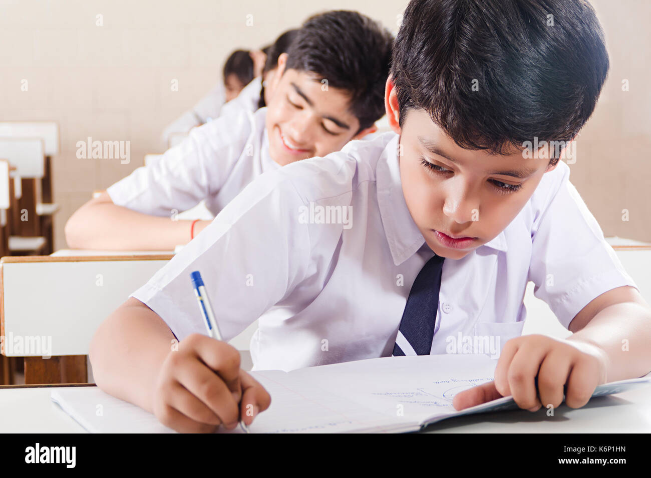 Smiling Indian School Kid Boy Student Note Book Writing Studying ...