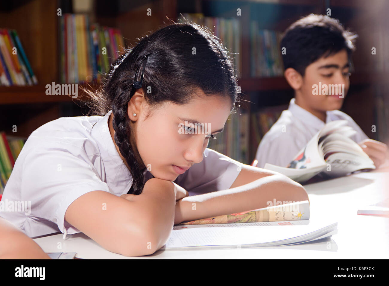 1 Indian School Girl Student Reading Book Study Education In Library ...