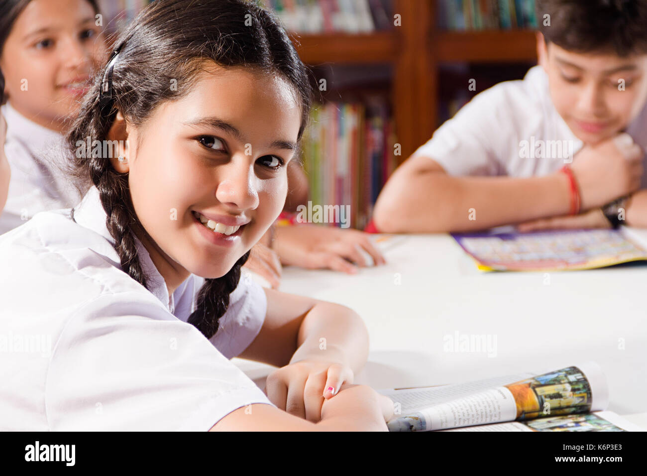 1 Indian School Girl Student Reading Book Study Education In Library ...