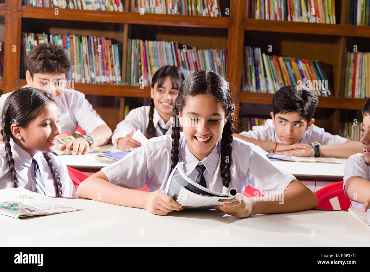 Group Indian School Students Boys And Girls Books Studying In Library ...