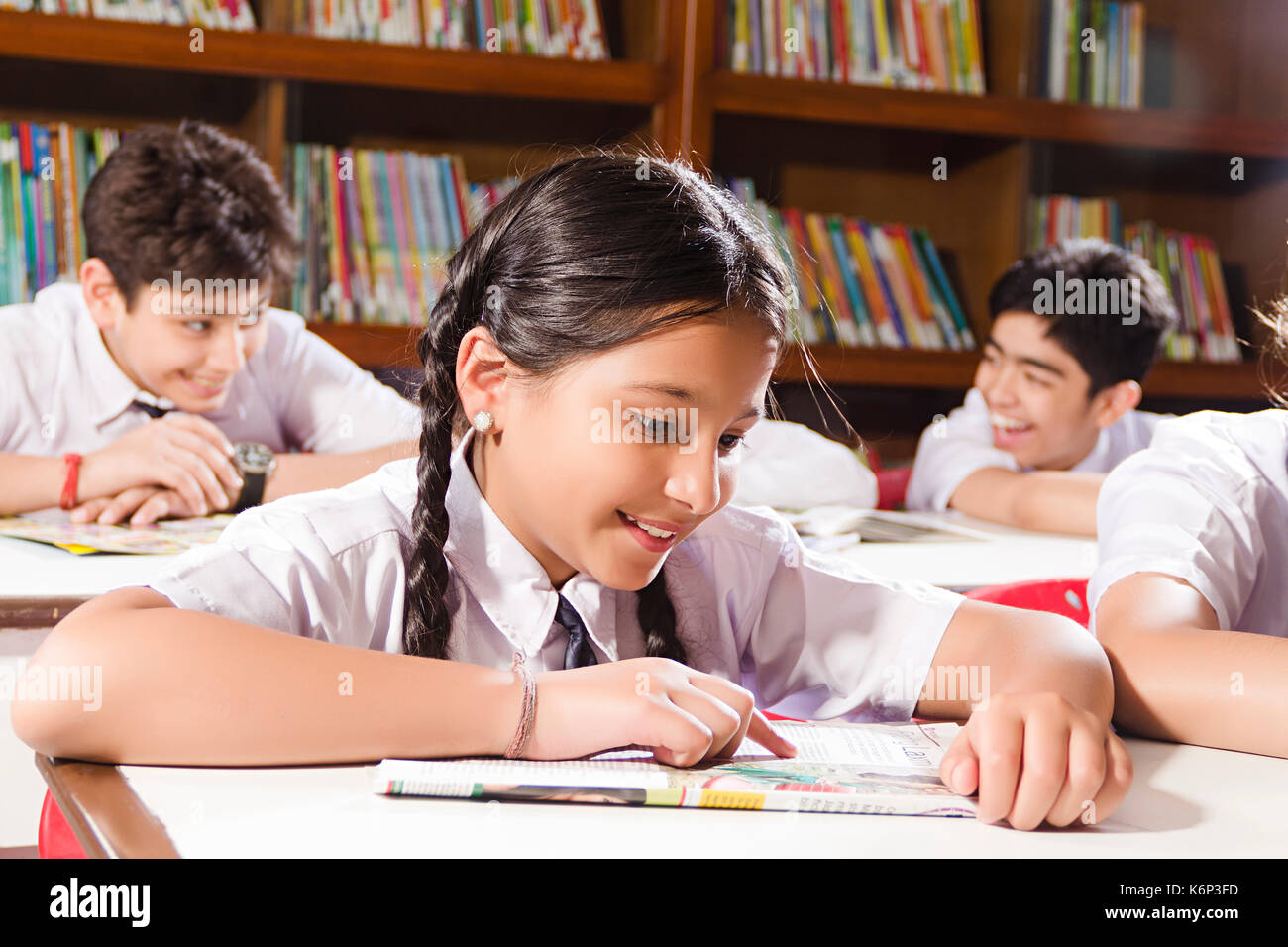 1 Indian School Girl Student Reading Book Study Education In Library ...