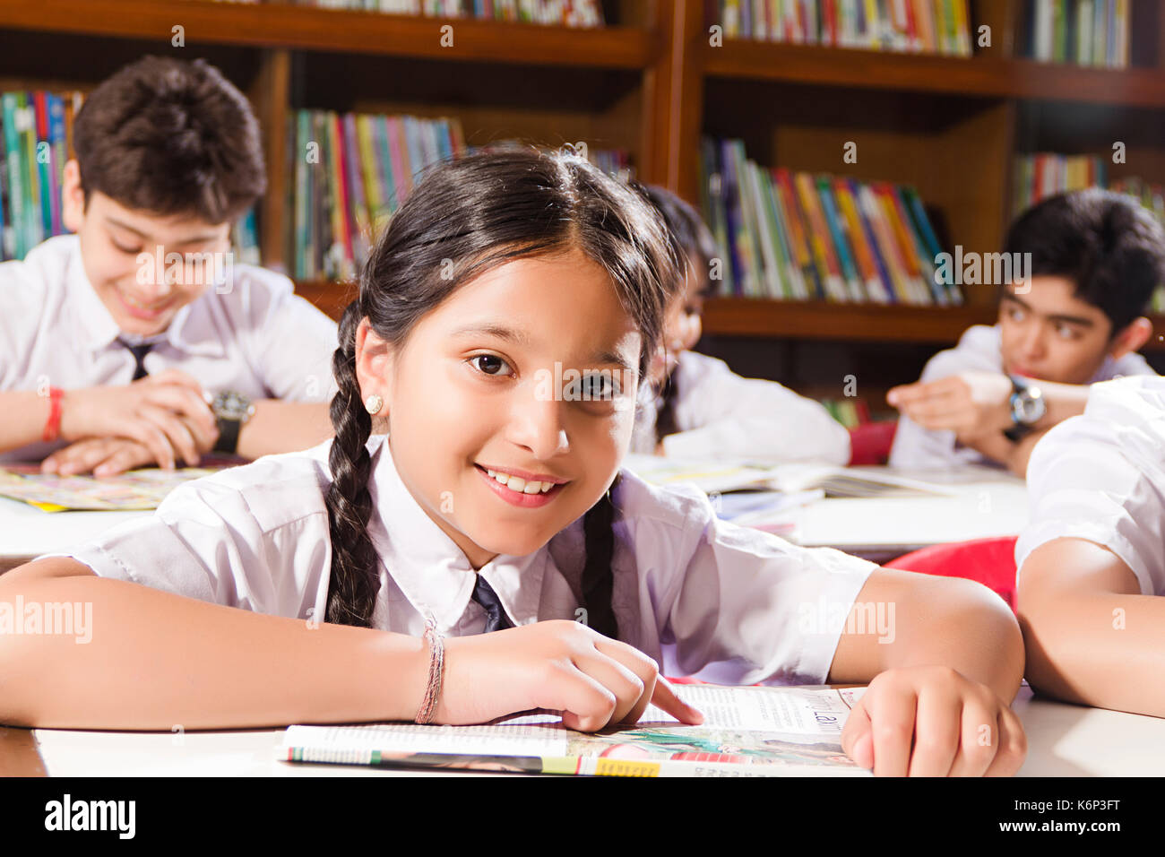 1 Indian School Girl Student Reading Book Study Education In Library ...