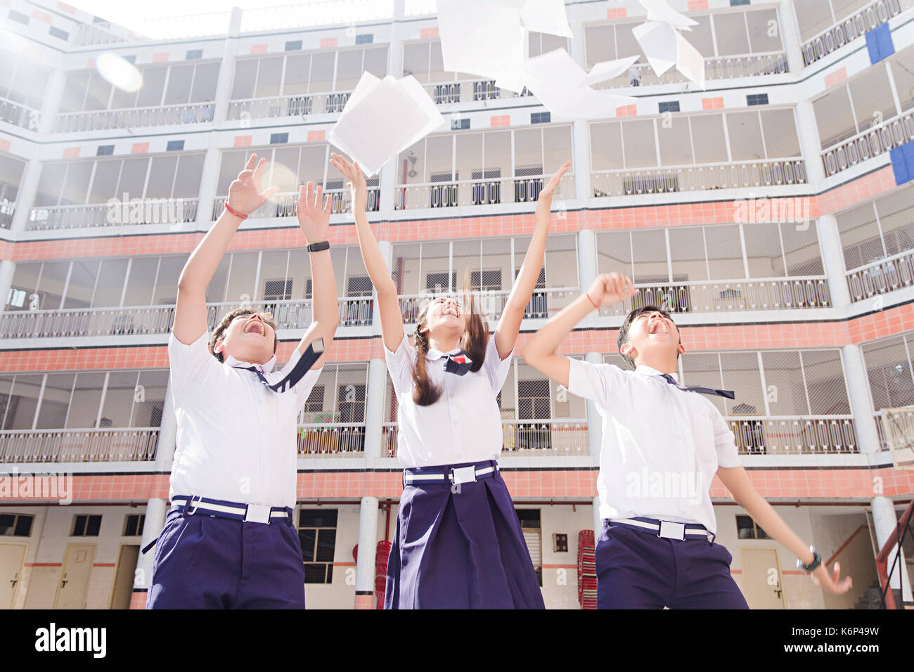 Successful School Students Throwing Papers Celebration Education In ...