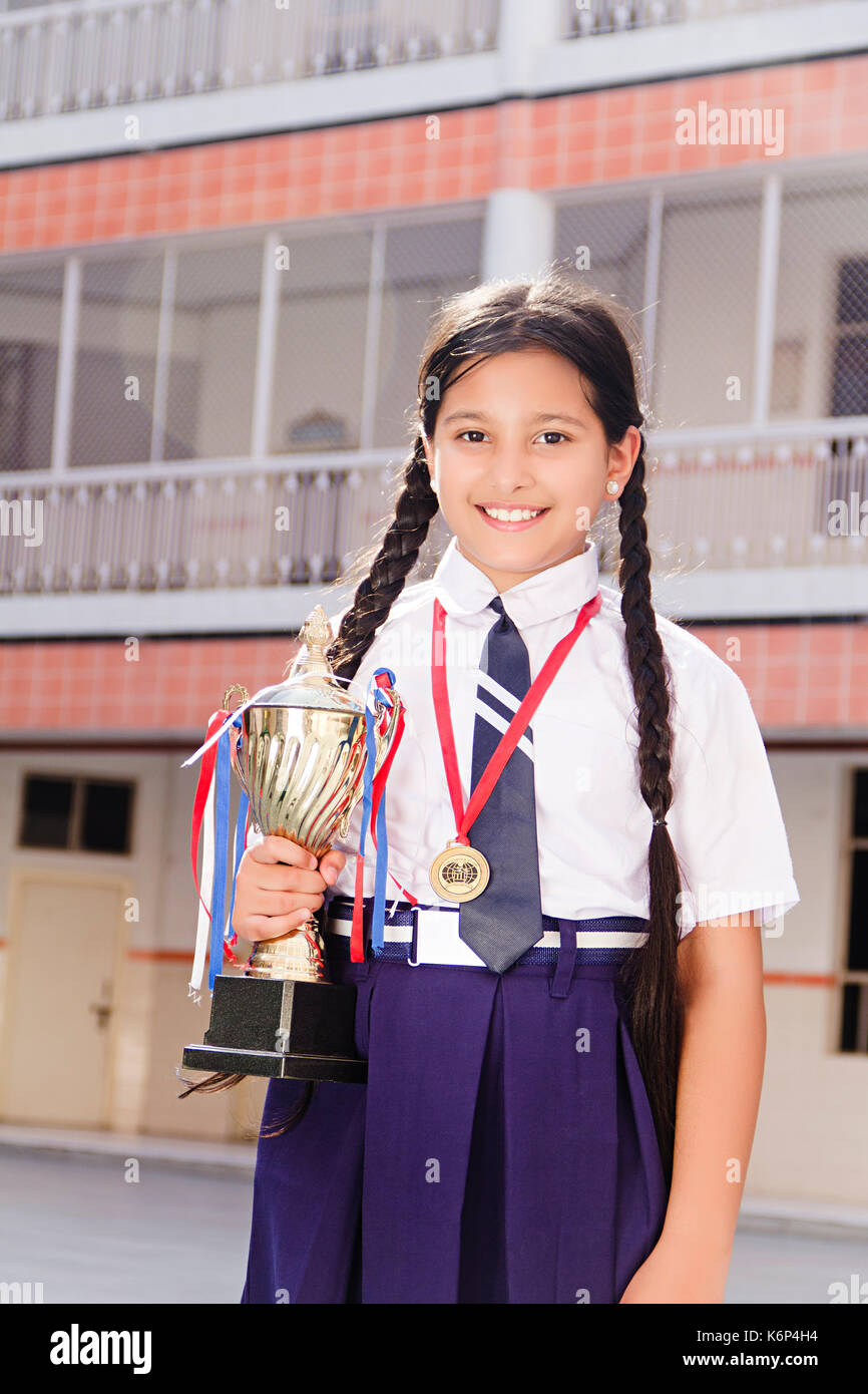 Girl holding trophy hi-res stock photography and images - Alamy