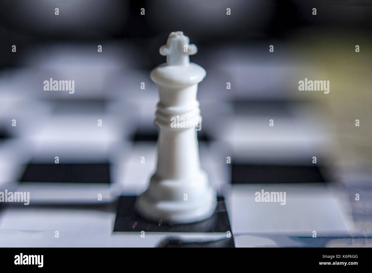 A white queen on the chess board Stock Photo - Alamy