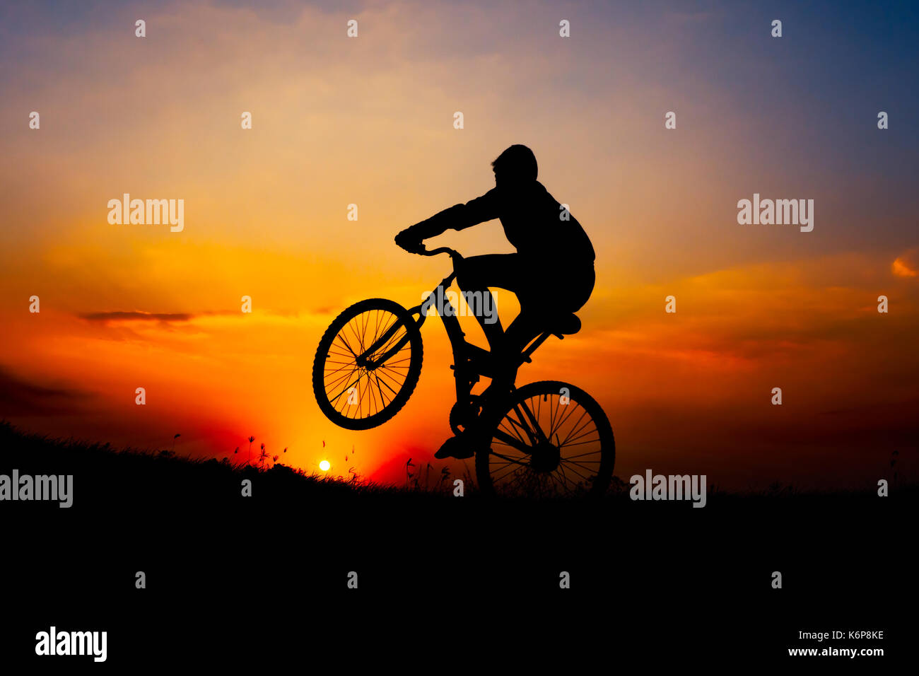 Boy riding bike night hi-res stock photography and images - Alamy
