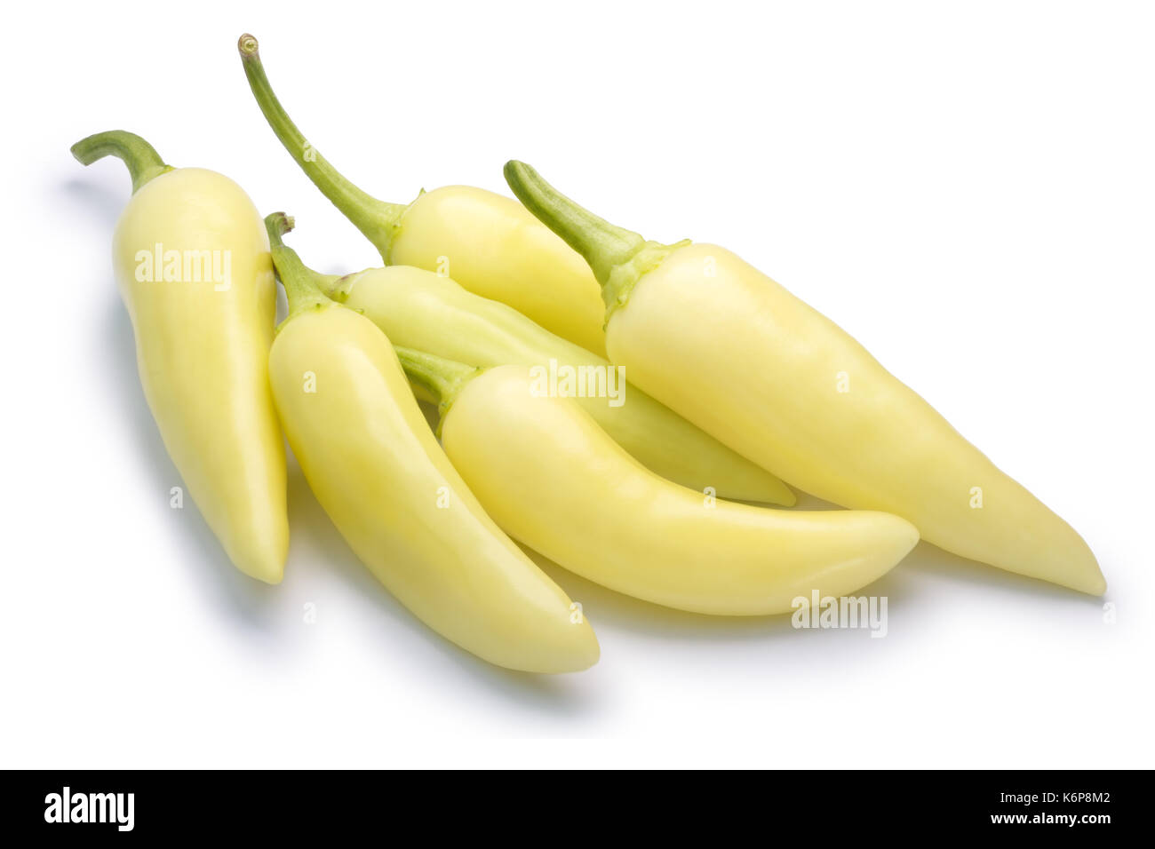 Banana peppers chiles (Capsicum annuum), pile of whole pods, pale ...