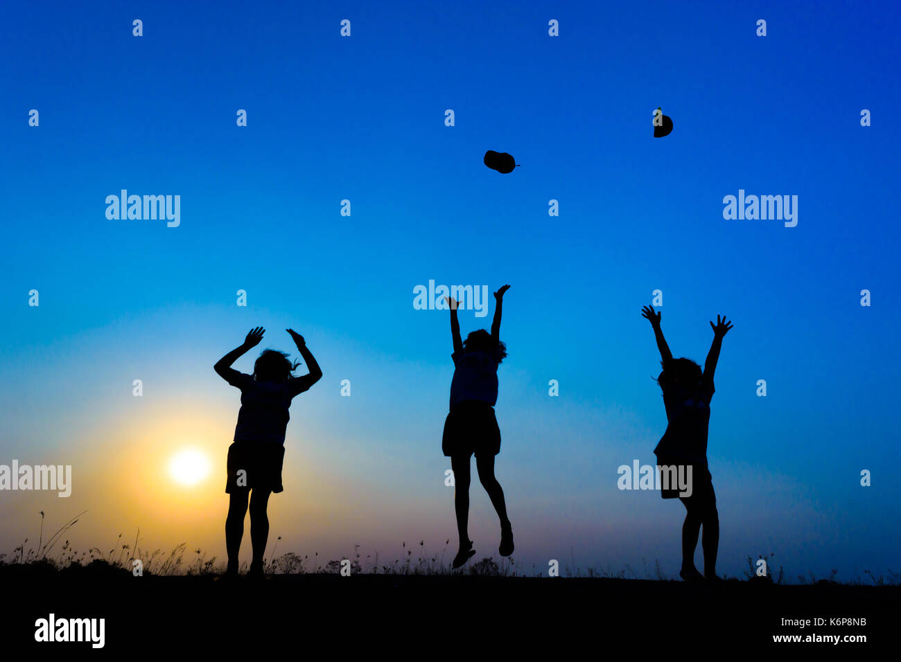 Children Silhouette Jumping