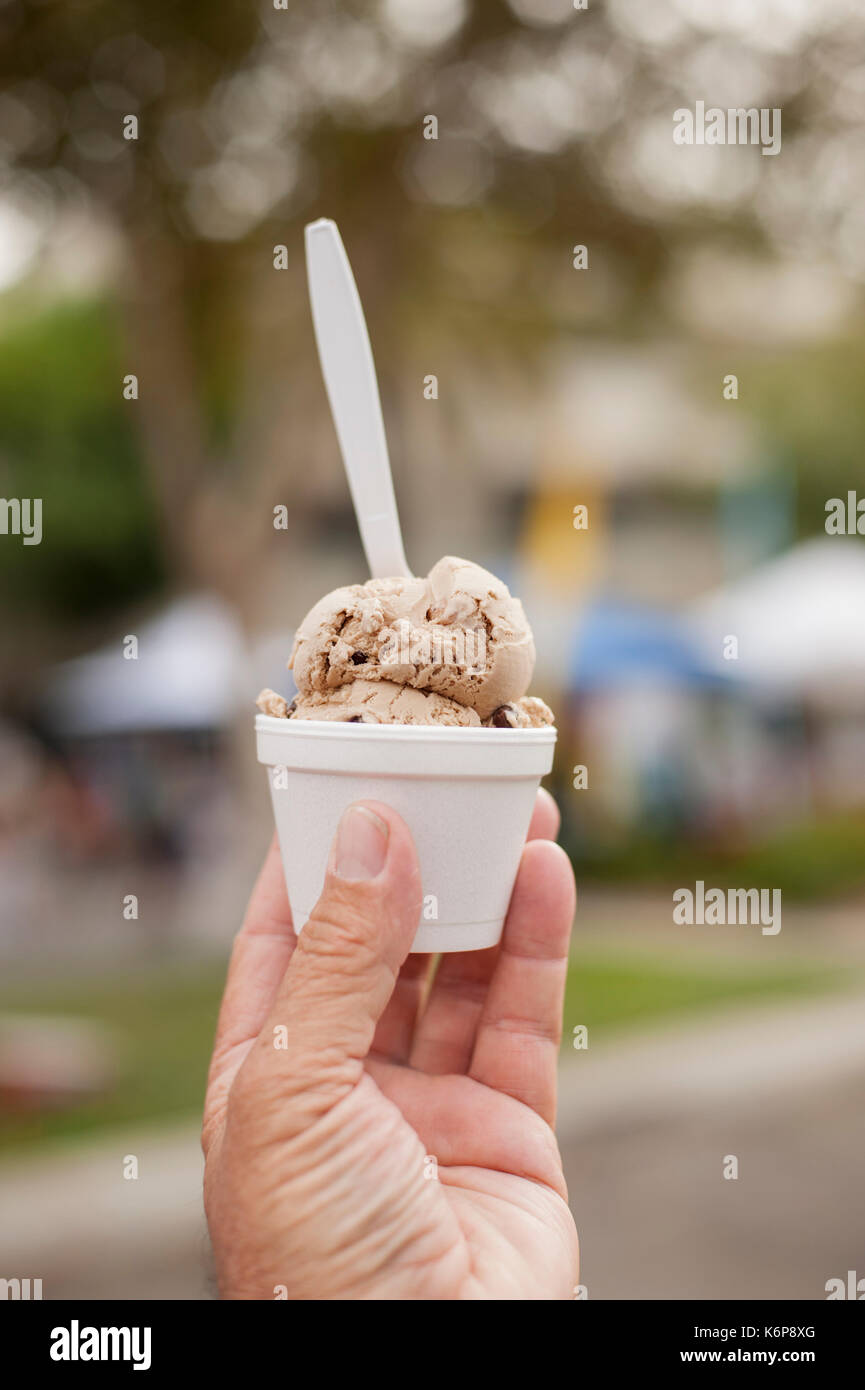 hand holding hand made ice cream Stock Photo - Alamy