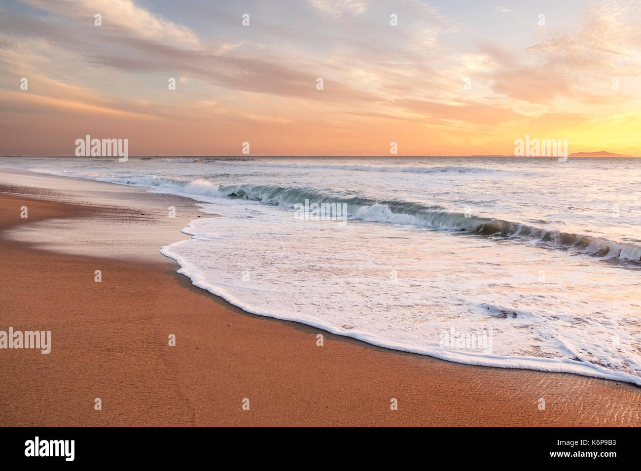 beach scene at sunset Stock Photo - Alamy