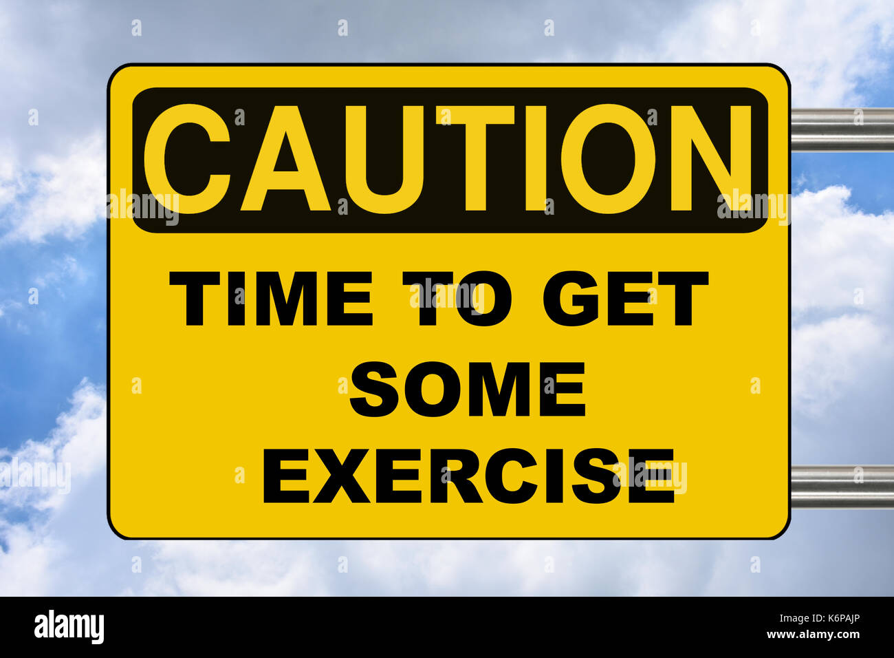Time to get some exercise, yellow warning street sign Stock Photo - Alamy