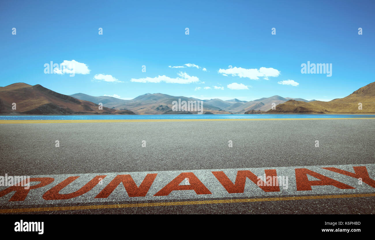 View of the empty asphalt road with runaway word and beautiful mountain ...