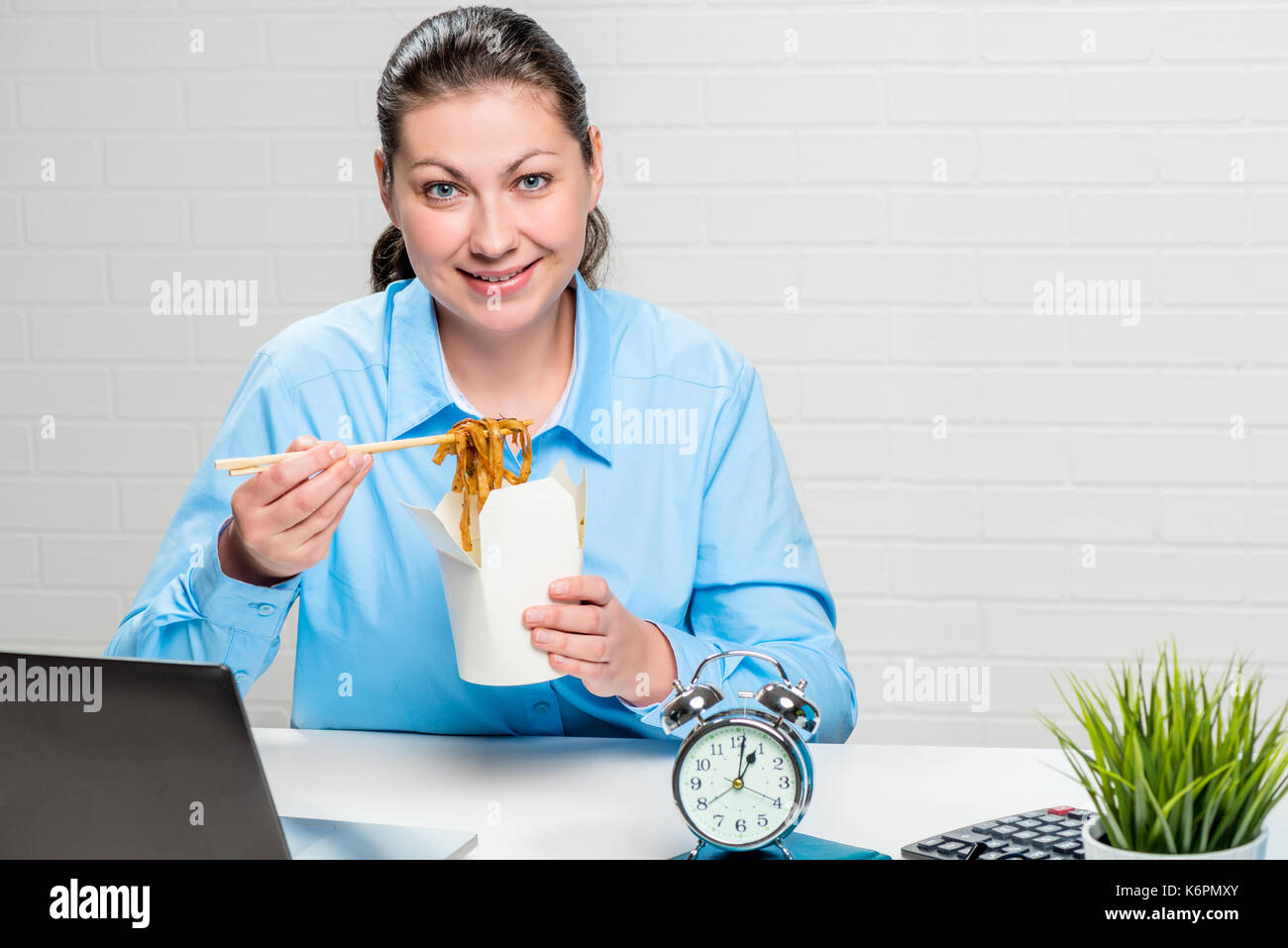 Portrait of an accountant with noodles in the office at the desk Stock ...