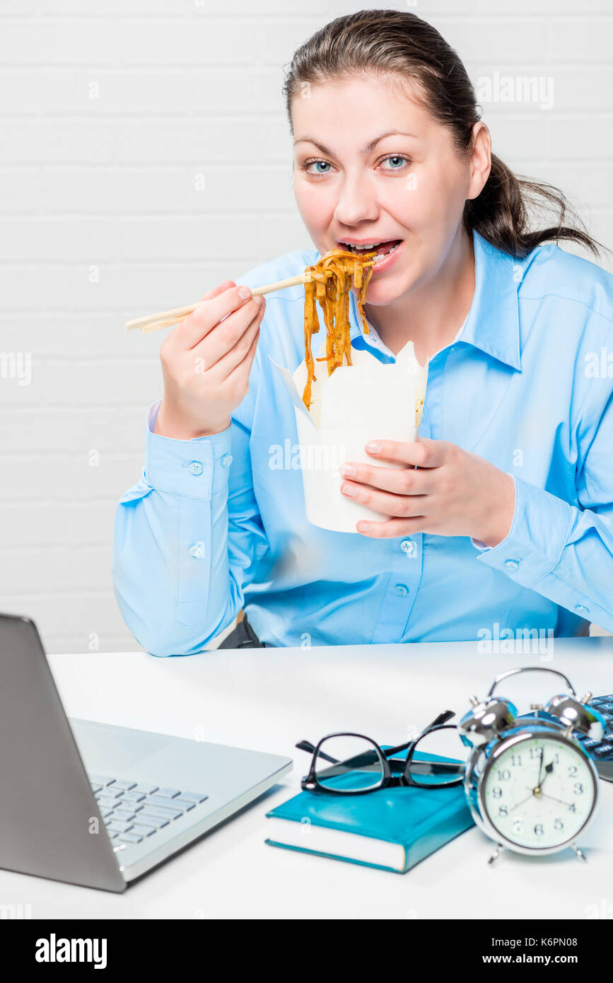Unhealthy eating at desk hi-res stock photography and images - Alamy