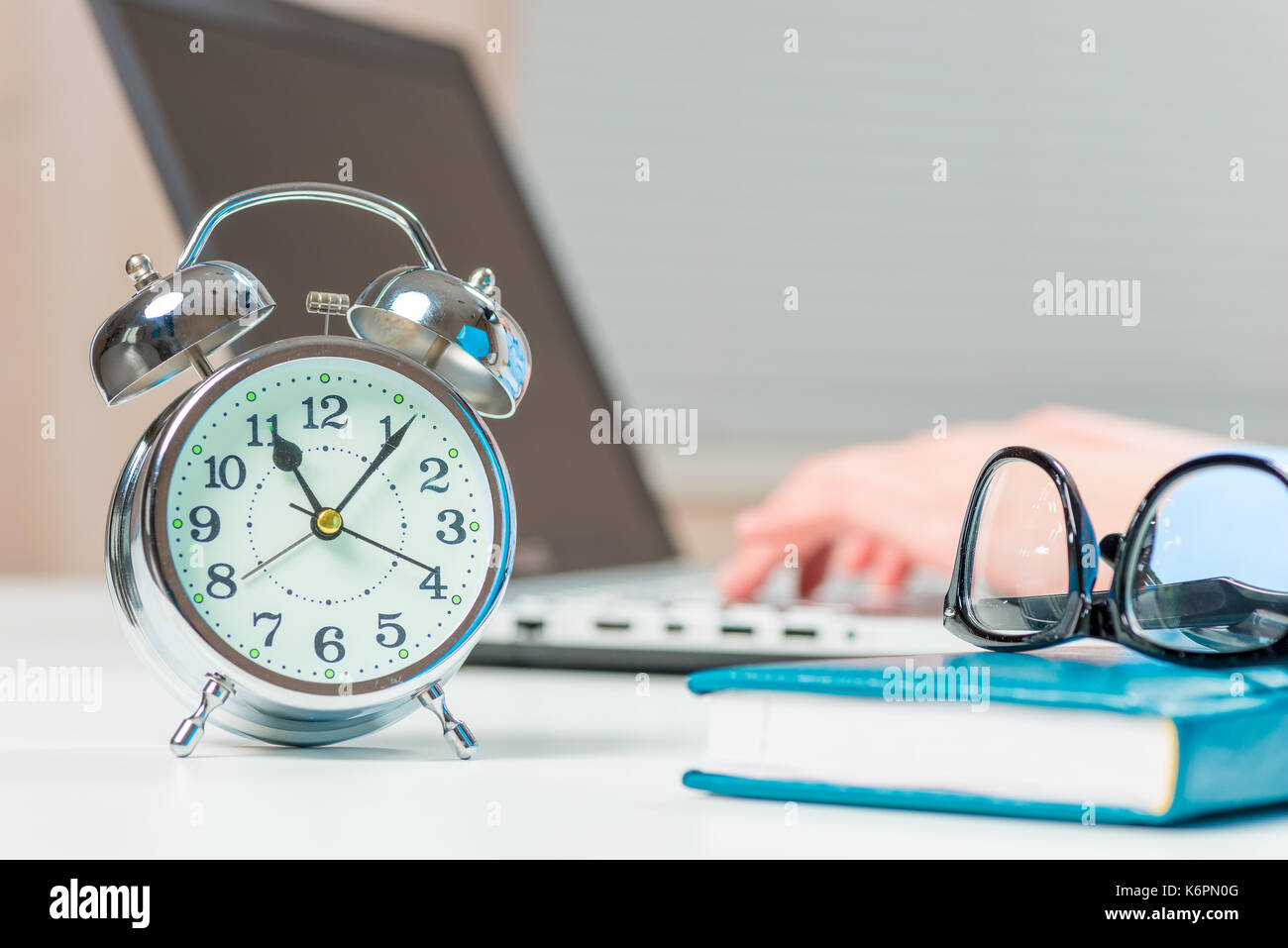 Hours show 11 hours the very heat of the working day in the office ...